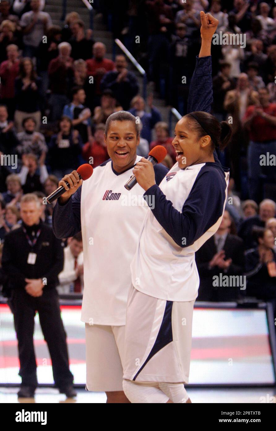 Connecticut's Kaili McClaren, left, smiles as she and teammate Maya ...