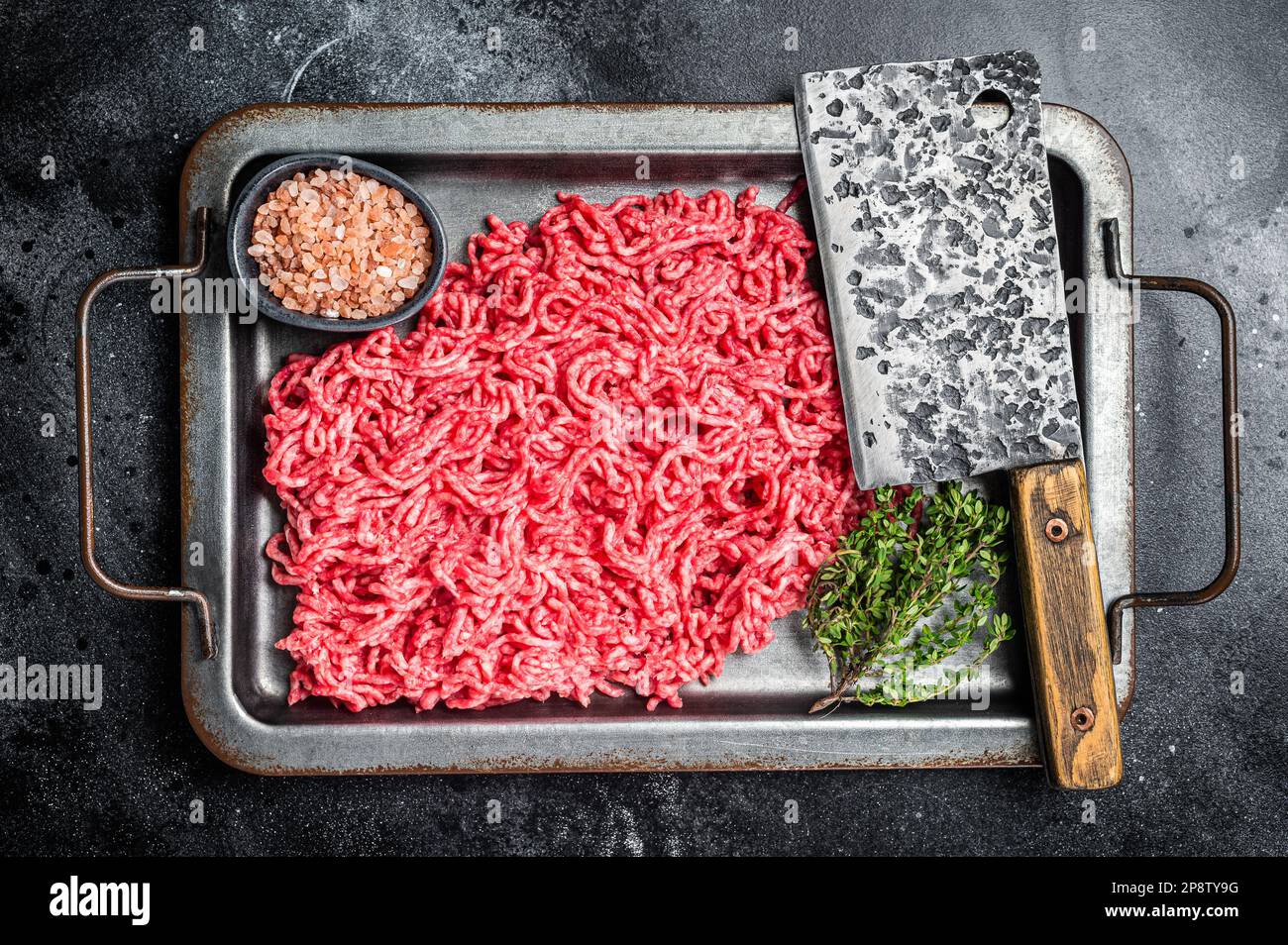 Raw Forcemeat , Mince Ground beef and pork in a kitchen tray. Black ...