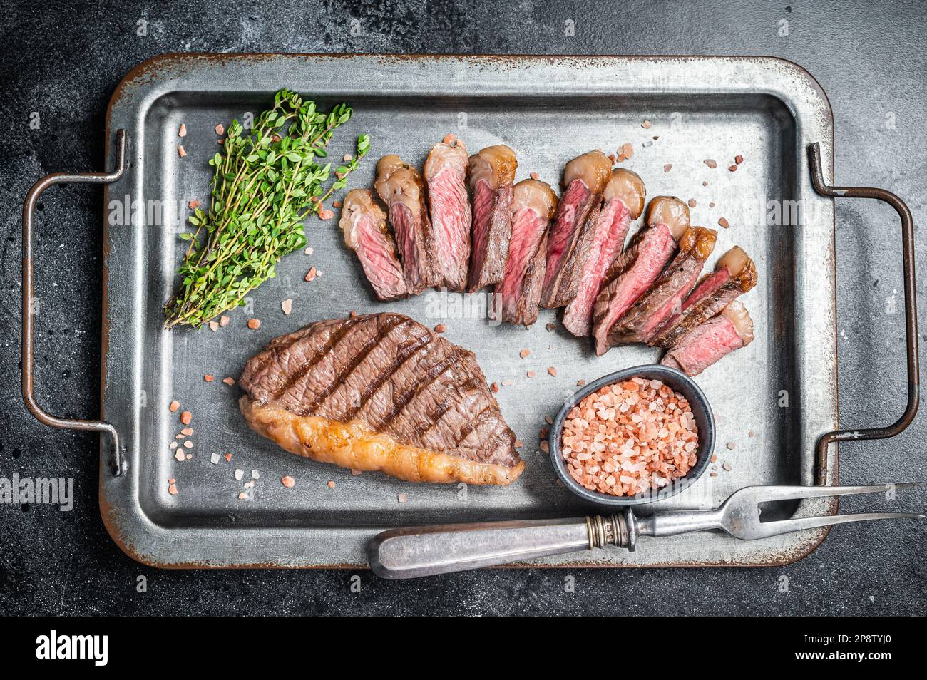 Fried and sliced Top sirloin steak, Grilled cup rump beef meat steak on ...