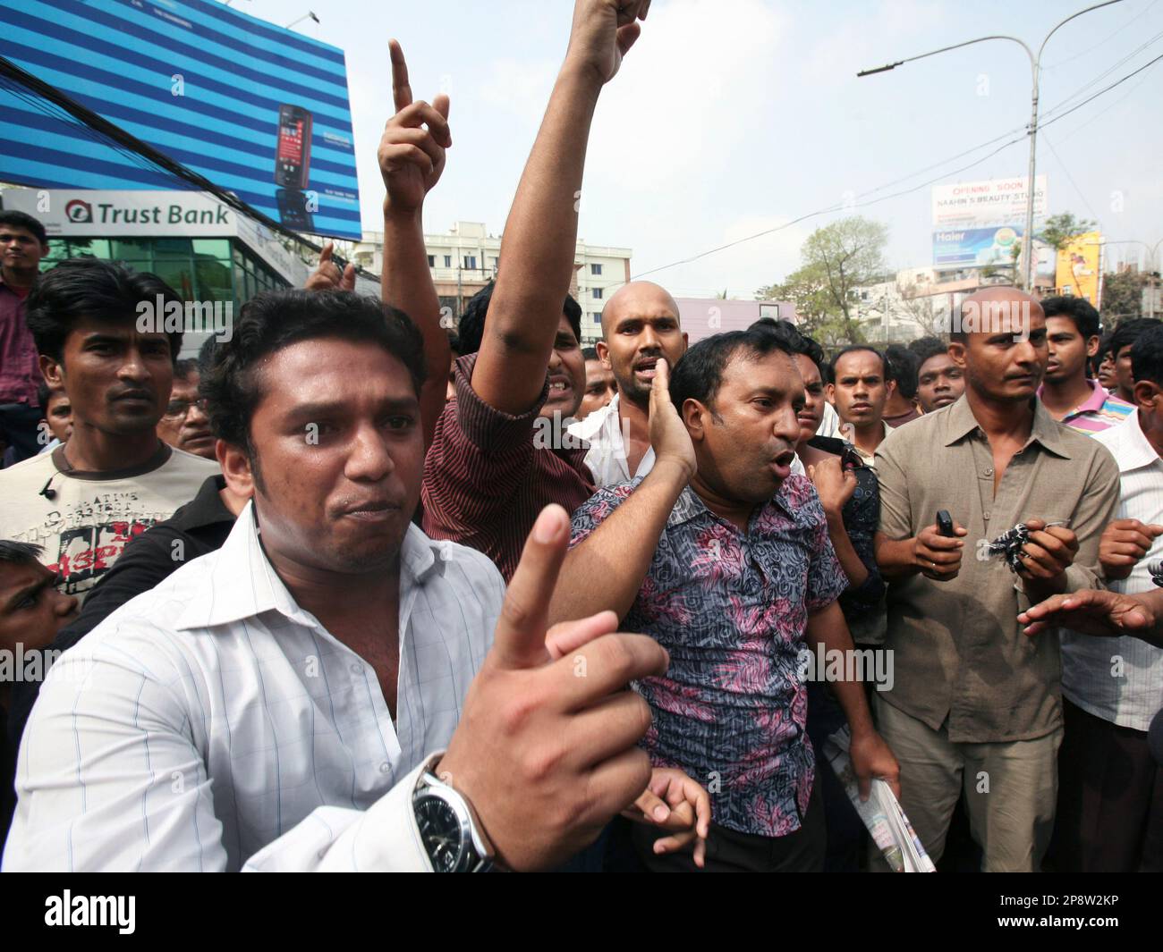 Anxious people gather before Bangladesh Rifles headquarters at ...