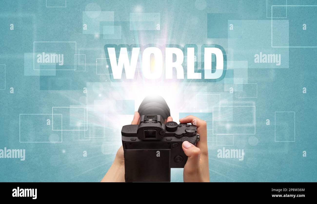 hand holding digital camera, traveling concept Stock Photo - Alamy