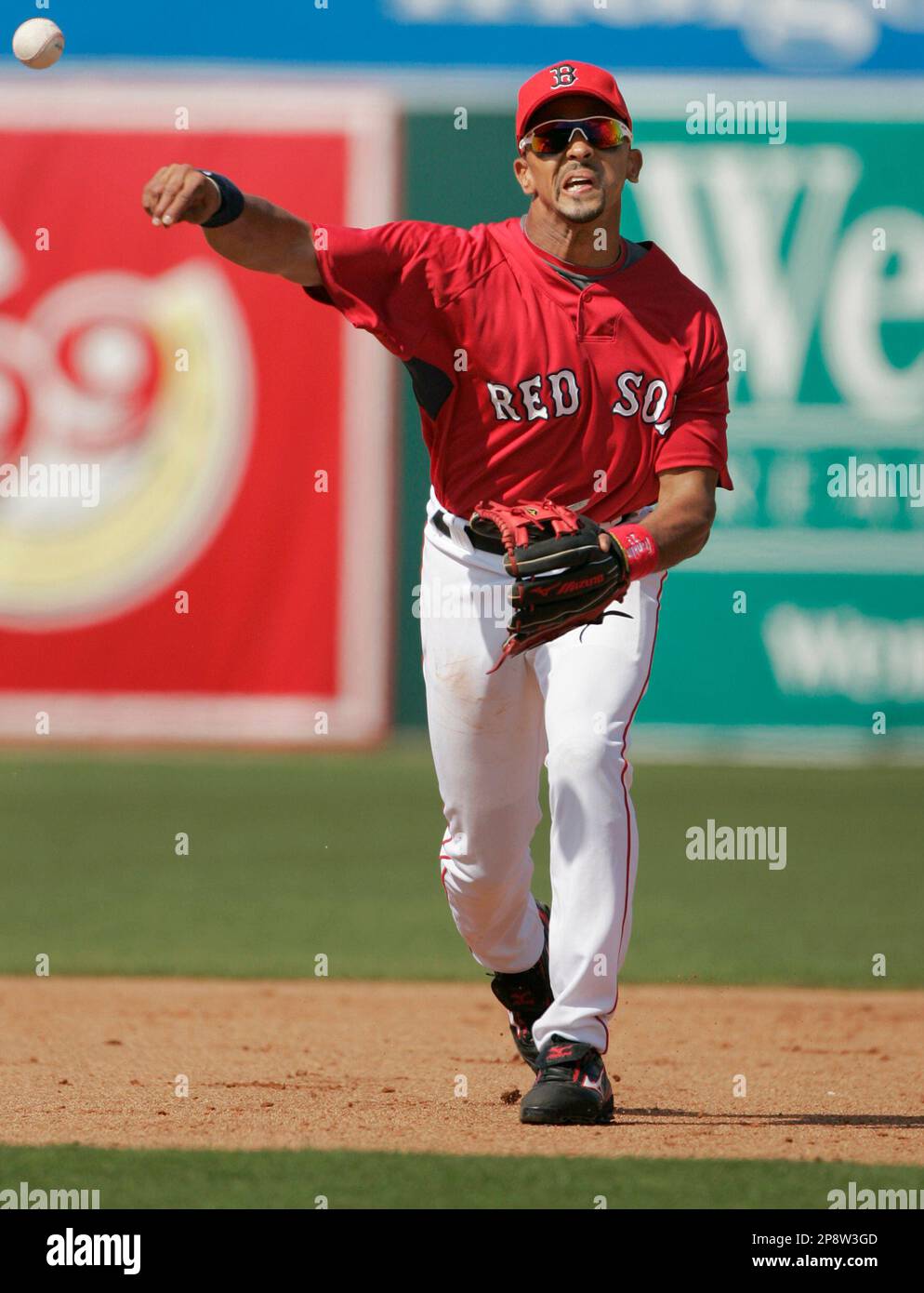 Boston Red Sox's Julio Lugo throws to first to retire Pittsburgh ...