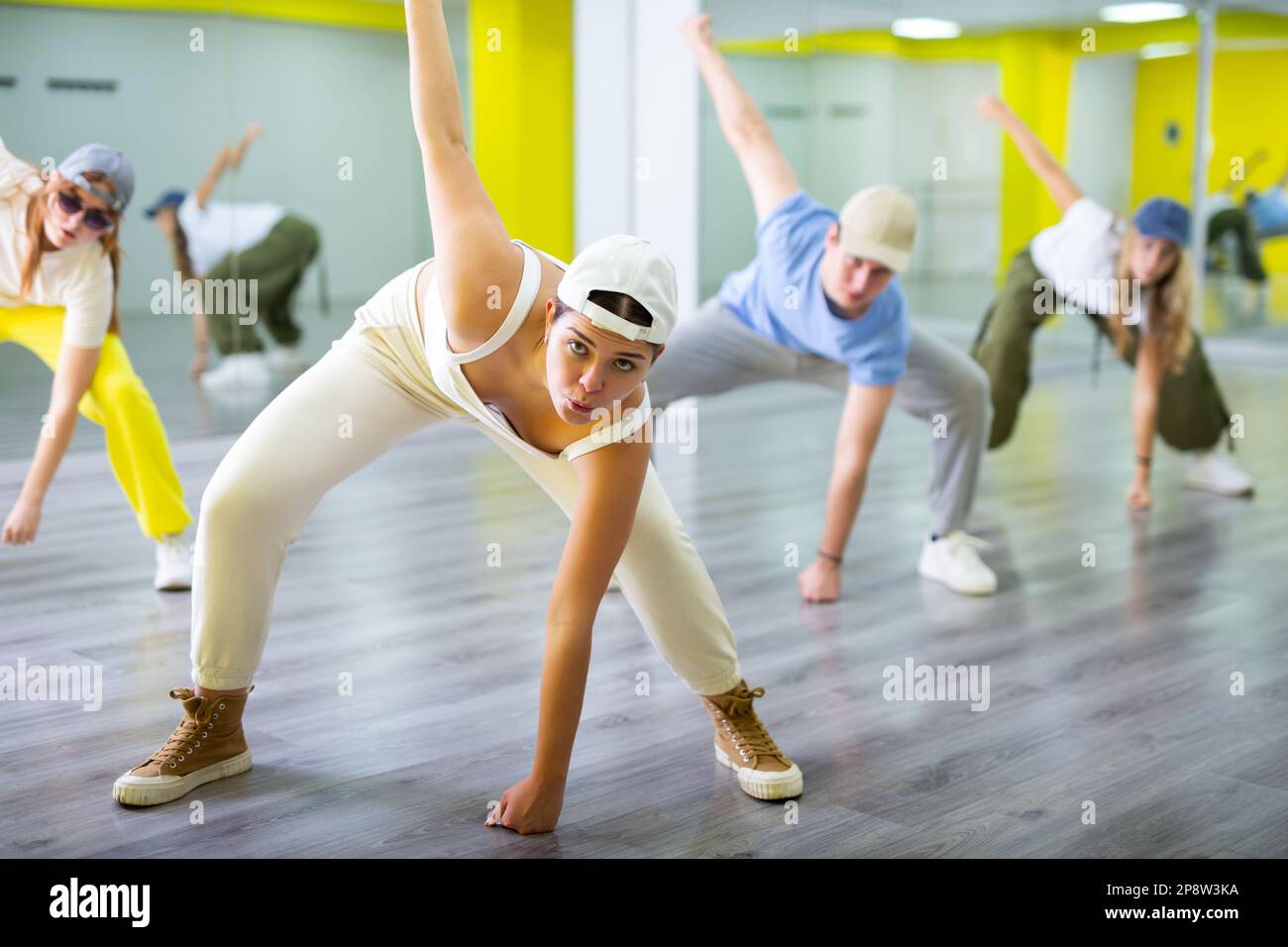 Dancer boys and girls showing different tricks and movements while ...