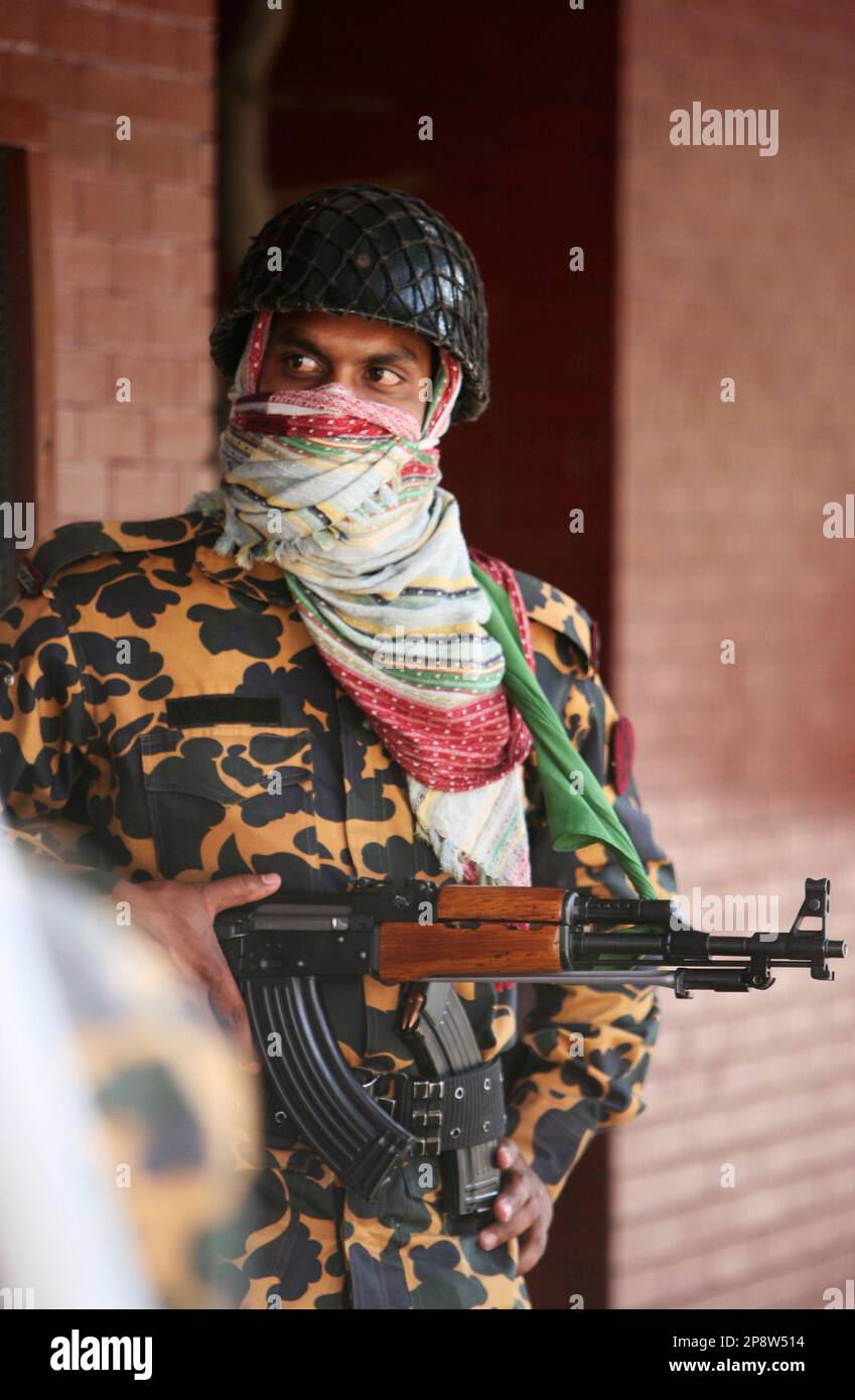 A Bangladesh border guards solider guards inside their headquarters in ...