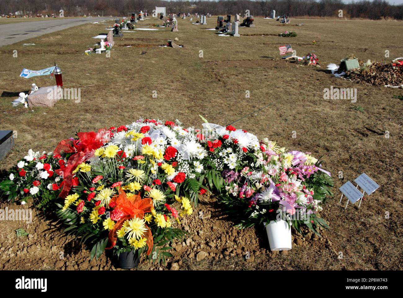 The grave of Kenzie Marie Houk and her unborn son Christopher A. Houk ...