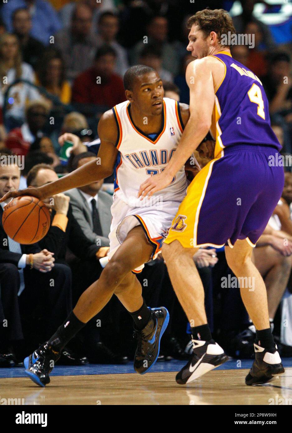 Oklahoma City Thunder's Kevin Durant, left, drives to the basket around ...