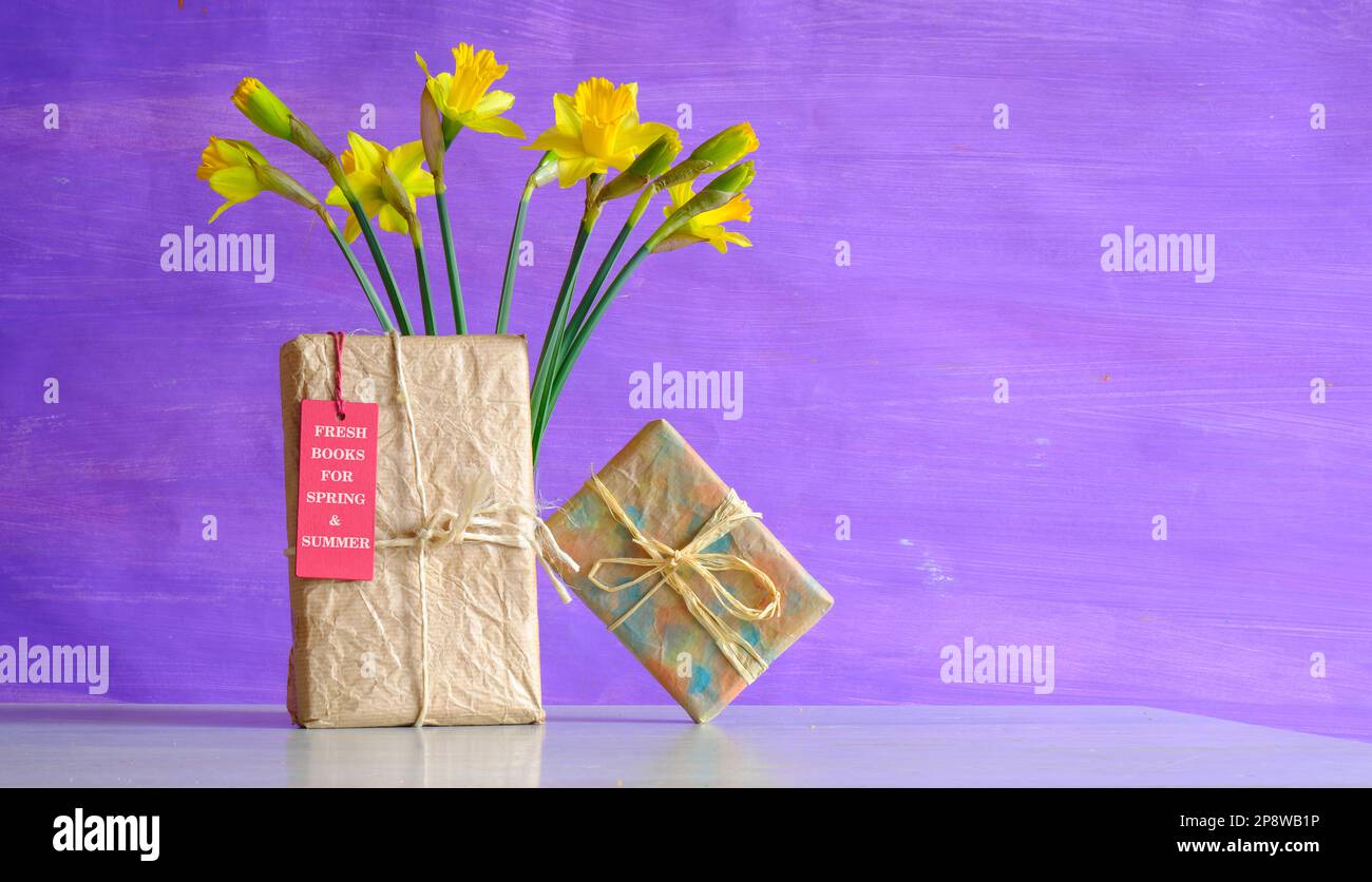 New book releases for spring 2023, gift wrapped books, hang tag and ...