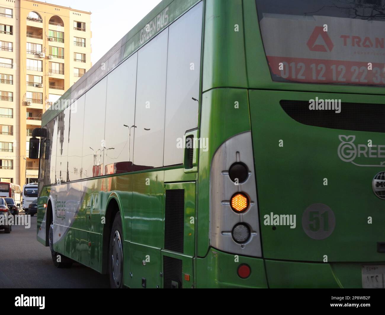 Cairo, Egypt, March 8 2023: The green bus for mass transit transporting ...