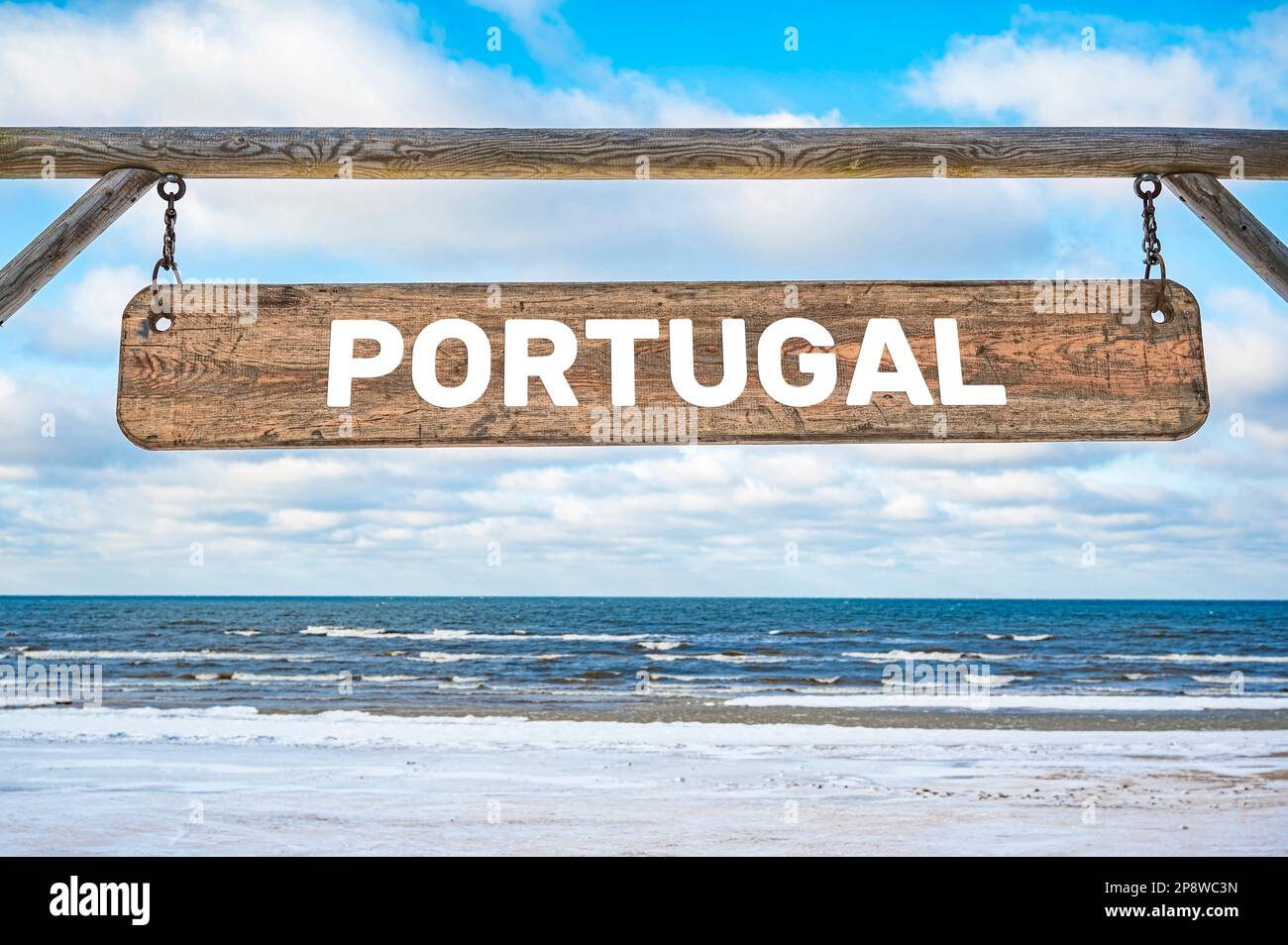 Portugal wooden sign against blue sky and sea with waves background ...