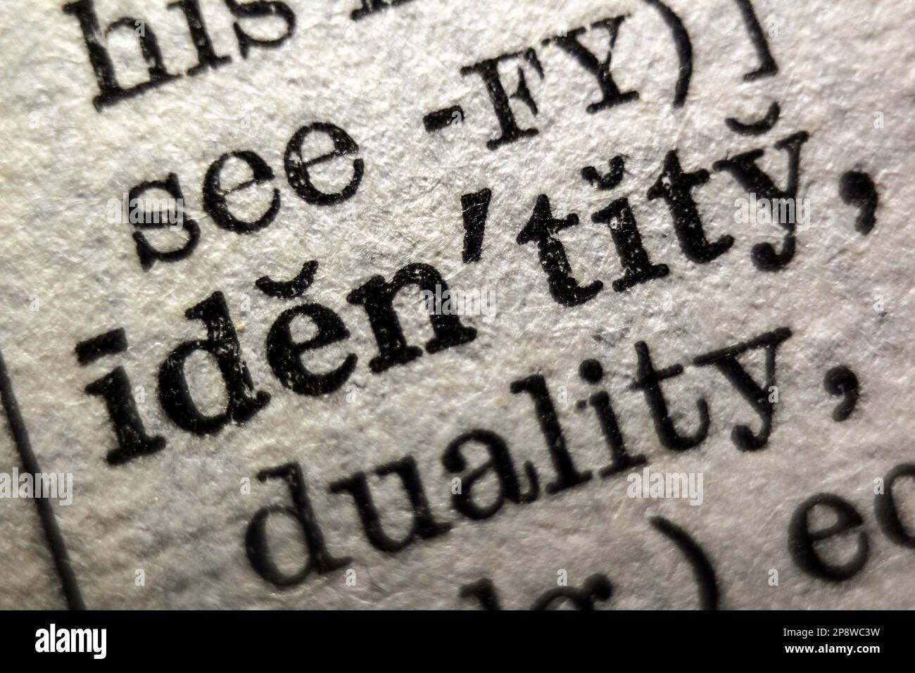 Definition of word identity on dictionary page, close-up Stock Photo ...