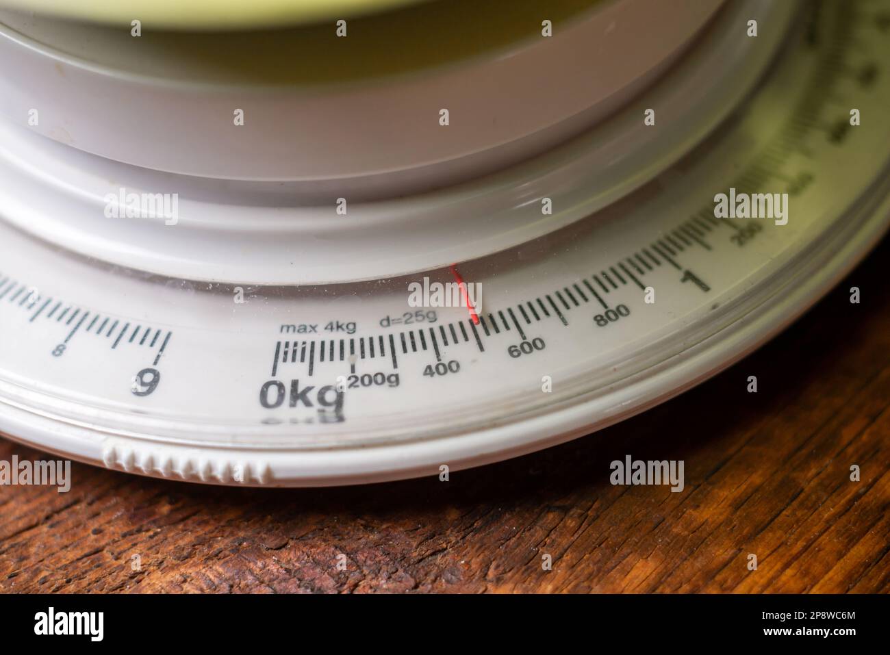mechanical kitchen scales on wooden background. Measurement of weight ...