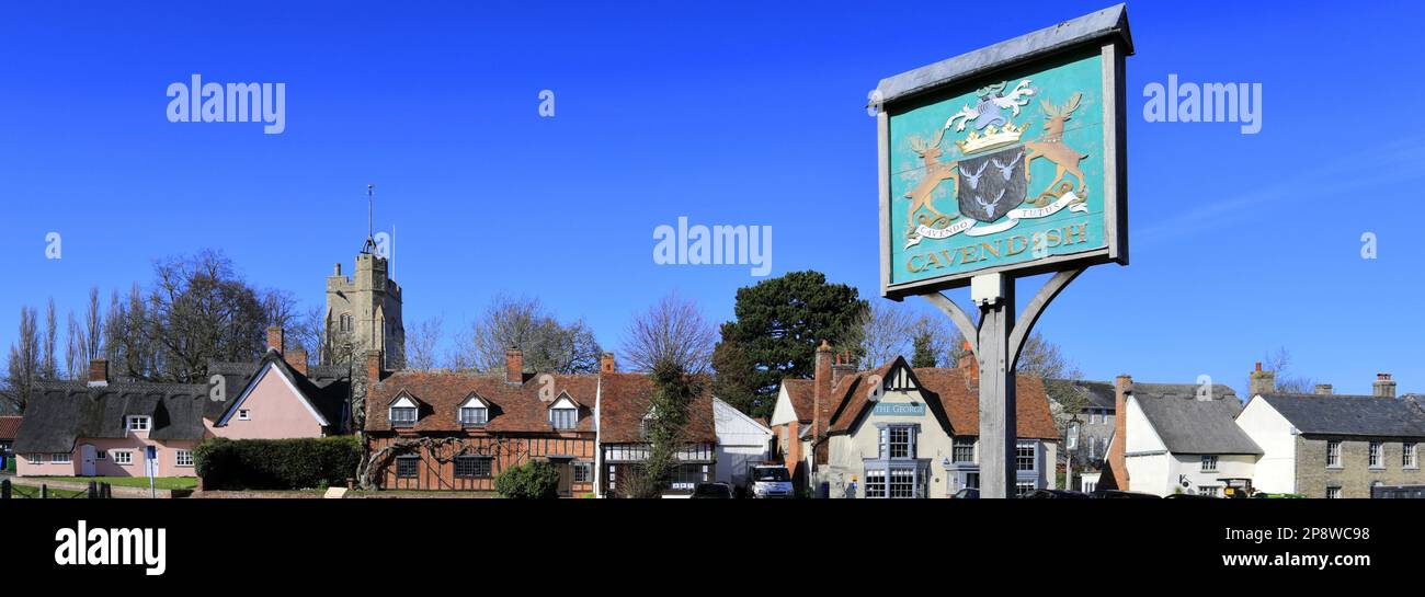 Cottages and the church of St Mary, Cavendish village, Suffolk, England ...
