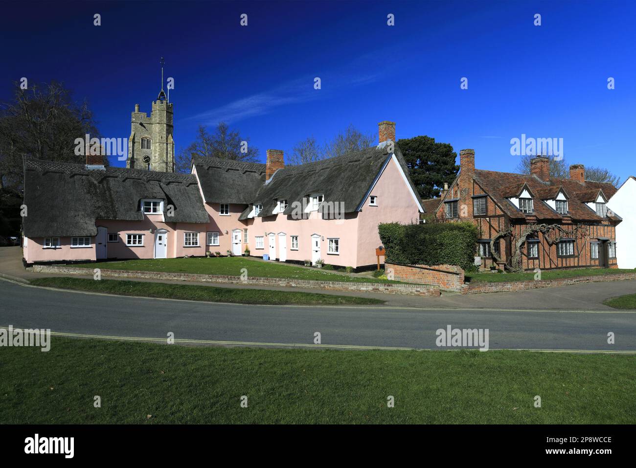 Cottages and the church of St Mary, Cavendish village, Suffolk, England ...