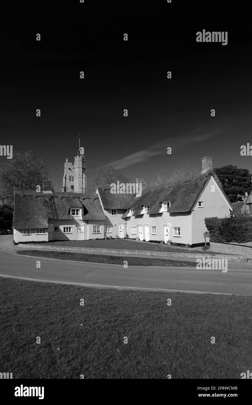Cottages and the church of St Mary, Cavendish village, Suffolk, England ...