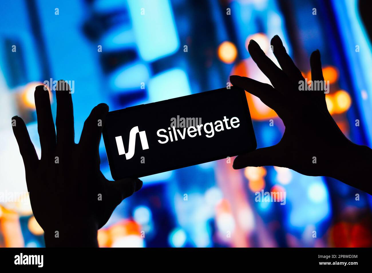 In this photo illustration, the Silvergate logo seen displayed on a ...