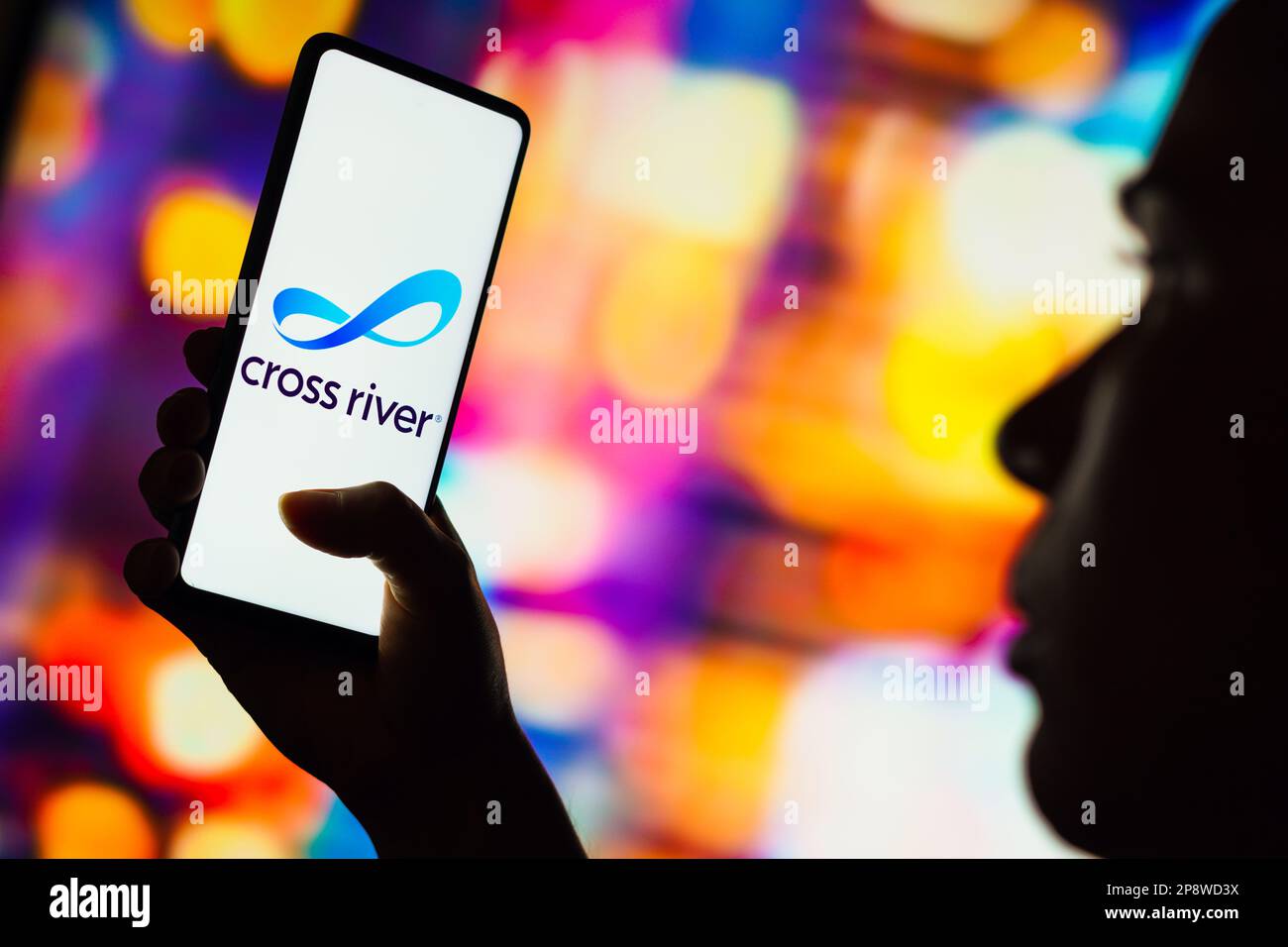 In this photo illustration, the Cross River logo seen displayed on a smartphone Stock Photo - Alamy