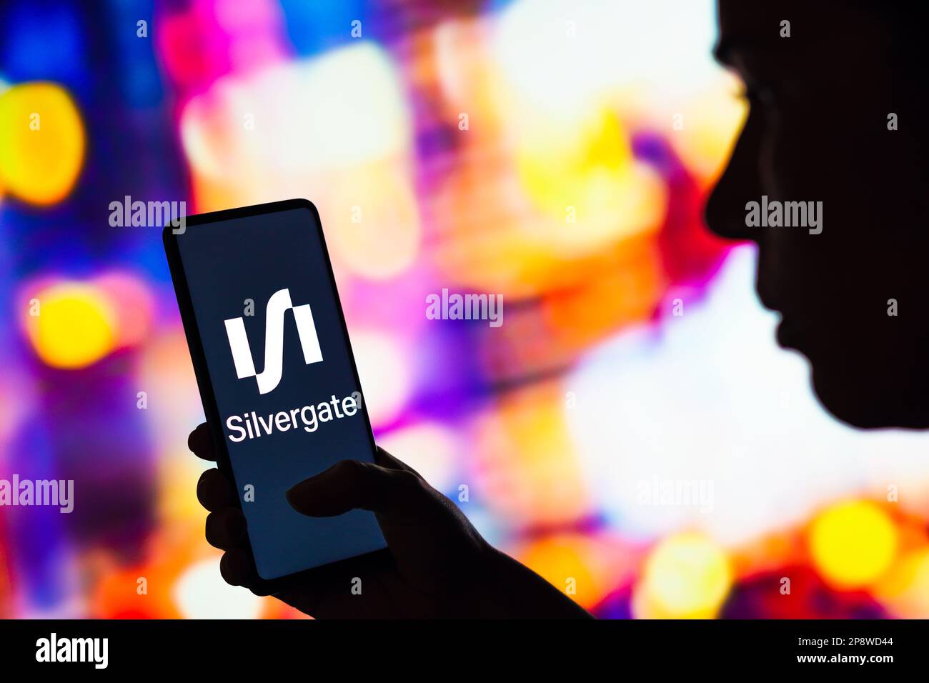 In this photo illustration, the Silvergate logo seen displayed on a ...