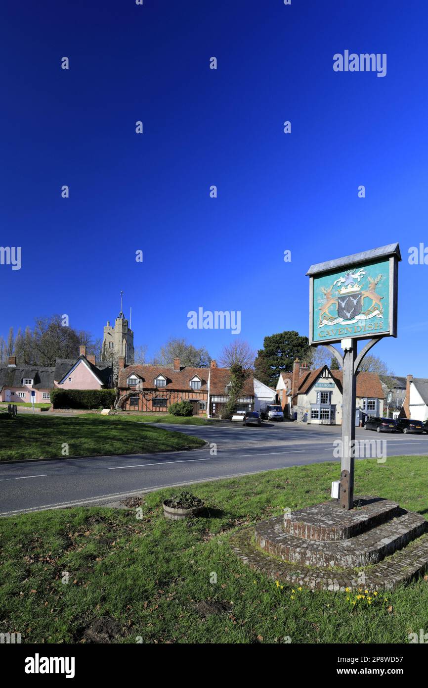 Cottages and the church of St Mary, Cavendish village, Suffolk, England ...