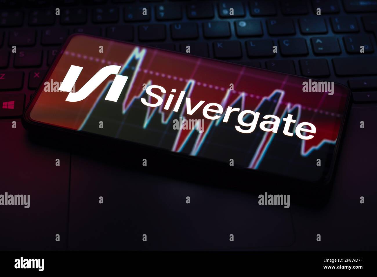 In this photo illustration, the Silvergate logo seen displayed on a ...