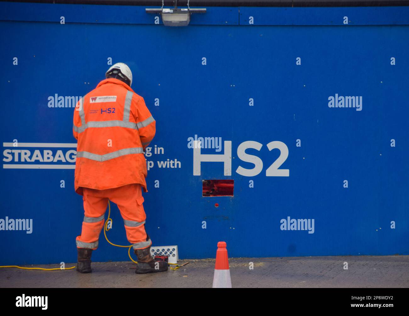 London, UK. 9th March 2023. A worker at the HS2 construction site near ...