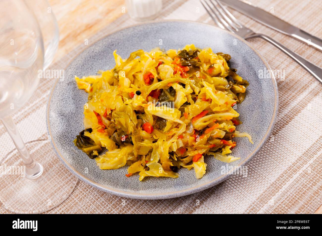 Tasty braised white cabbage with carrot and onion Stock Photo - Alamy