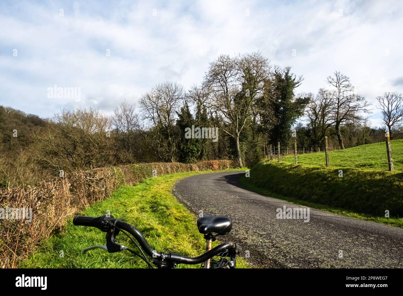 Road in countryside with turning and bike standing. Active rest ...