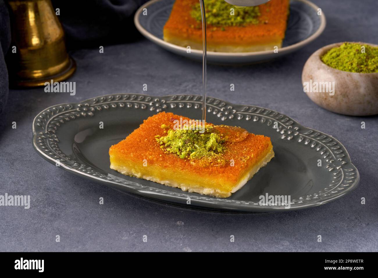 Middle eastern sweets kunefe, kunafa, kadayif with pistachio and syrup ...