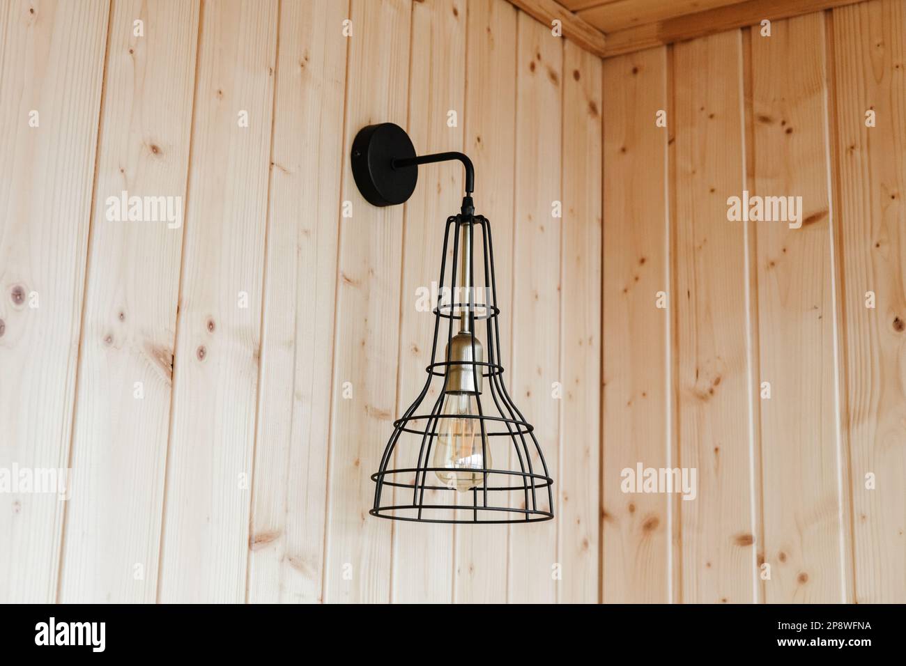 Interior detail. Stylish scandinavian composition of black bra with ...
