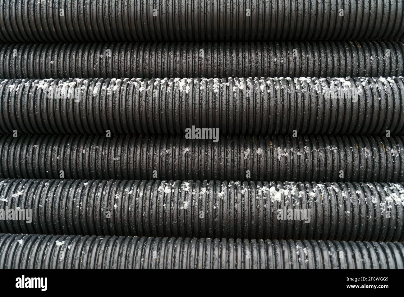 Texture of black corrugated pipes. Industrial backgrounds and textures ...
