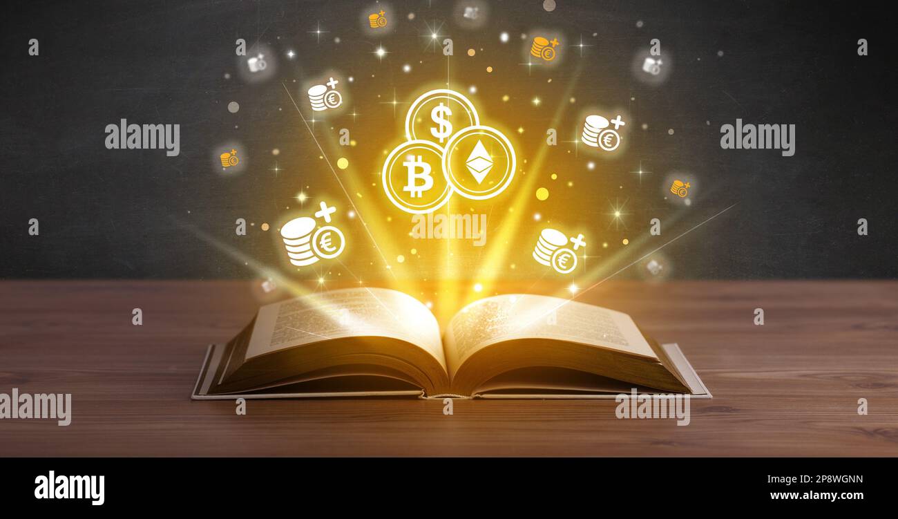 Open book with currency icons above Stock Photo - Alamy