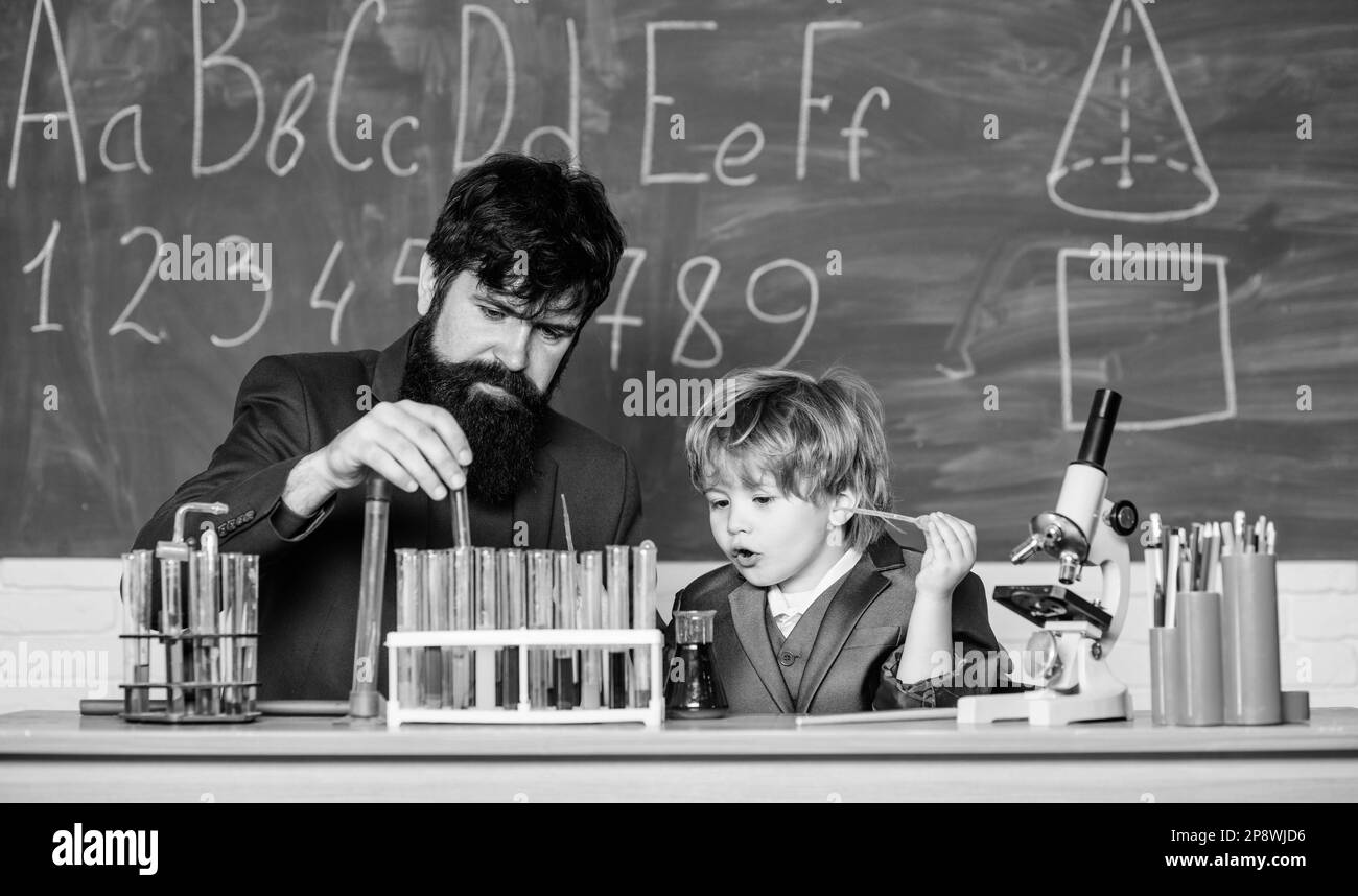 Cognitive skill. Back to school. Chemistry experiment. Teacher child ...