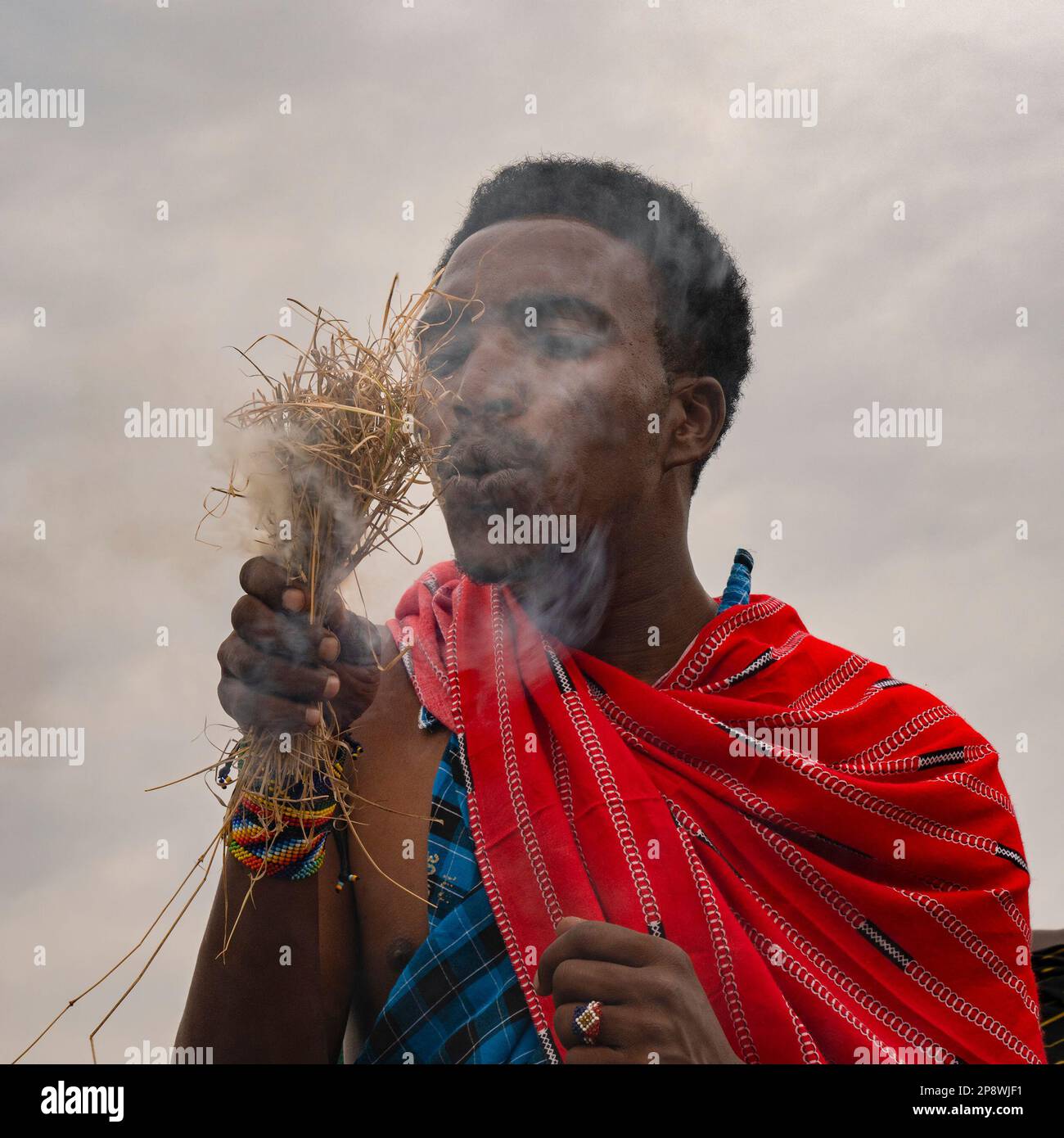 Karatu, Tanzania - October 16th, 2022: A masai man demonstrating a ...