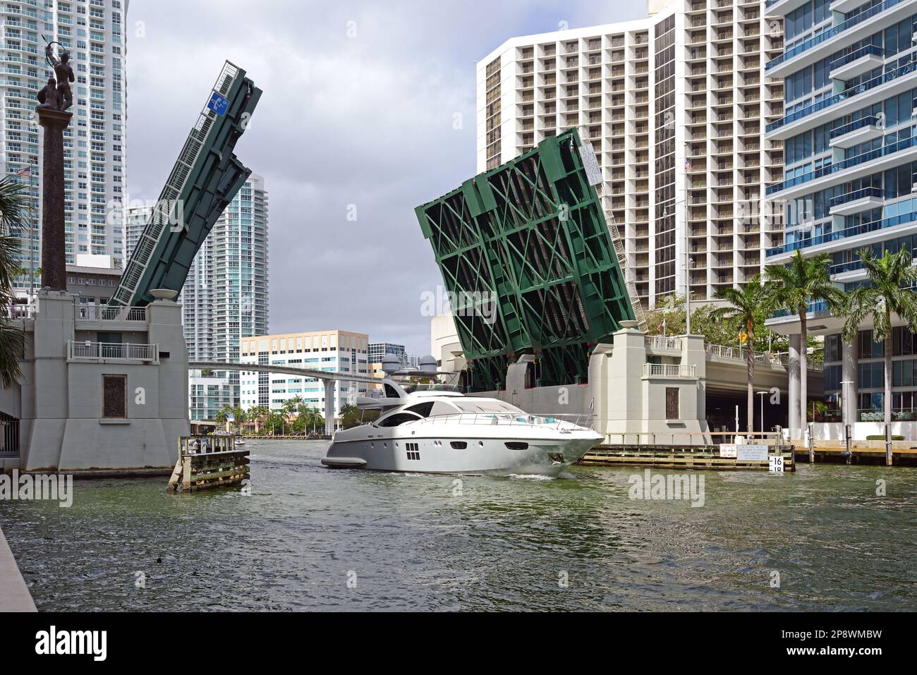 Luxury yacht and Brickell Avenue Bridge, bascule bridge over Miami ...
