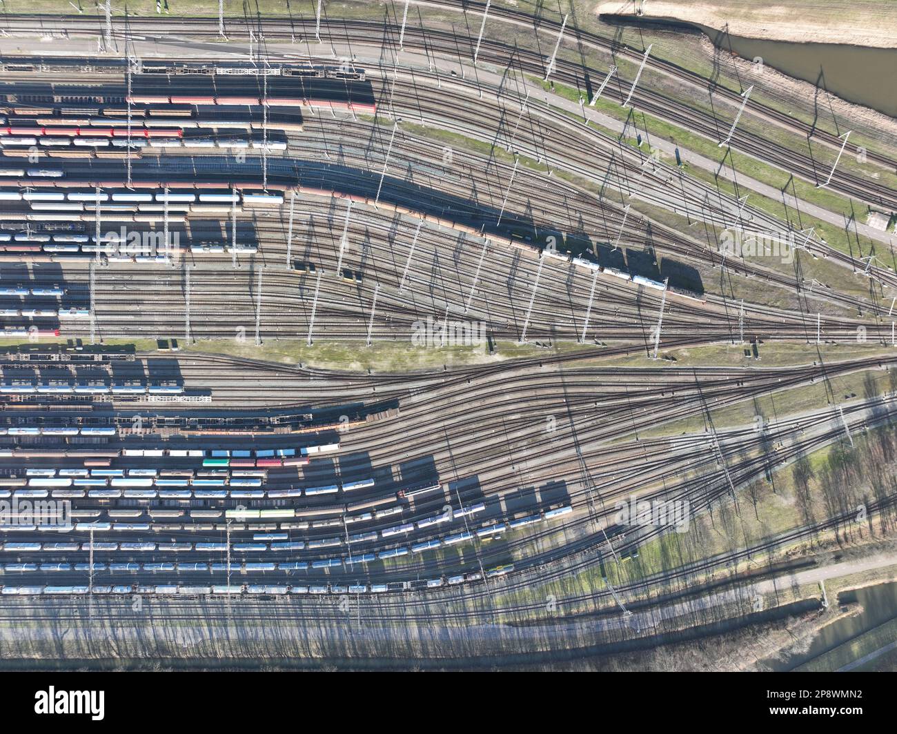 Aerial drone video showcasing the inner workings of a bustling railway ...