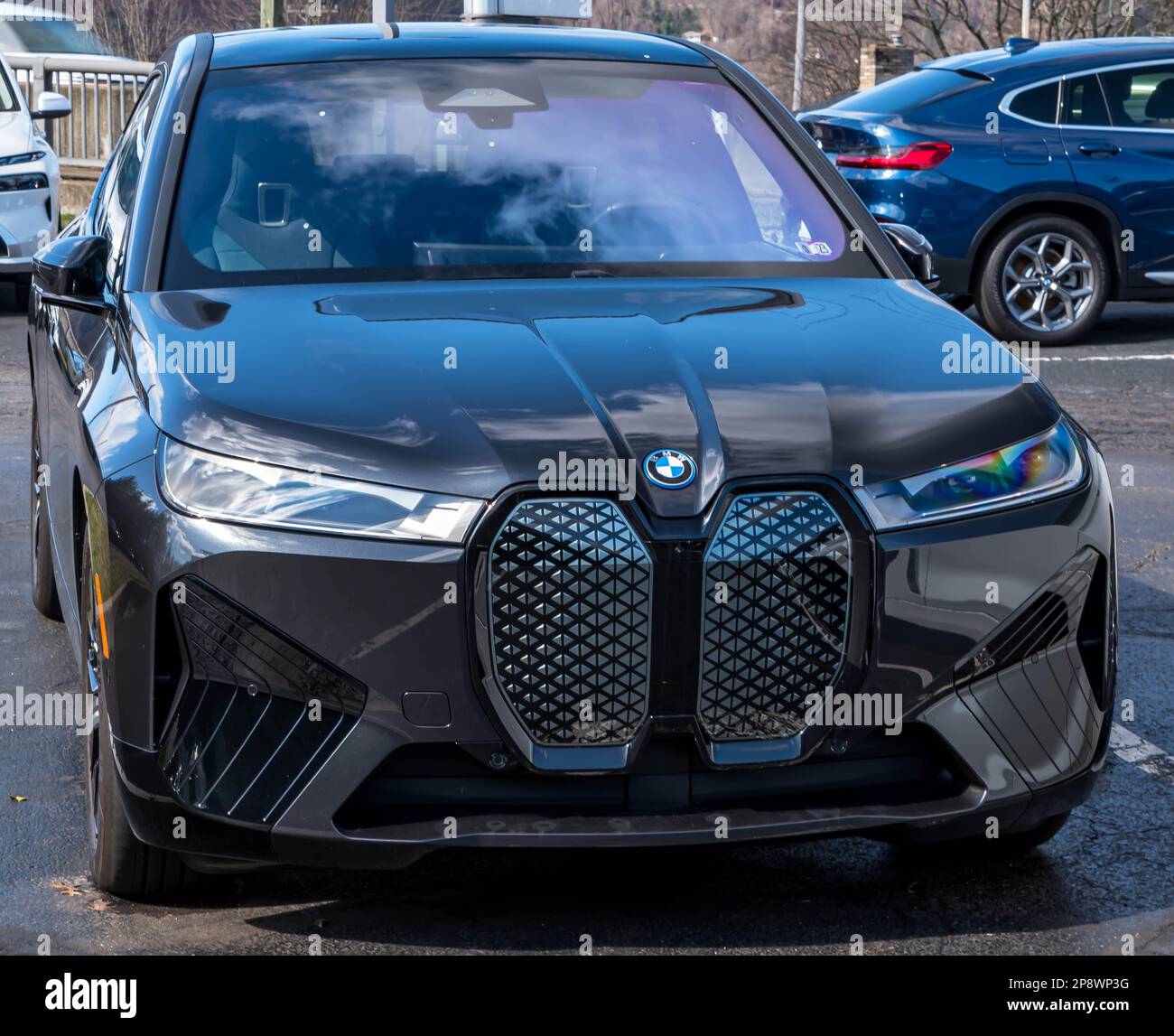 A new, black BMW sedan for sale at a dealership in Sewickley ...
