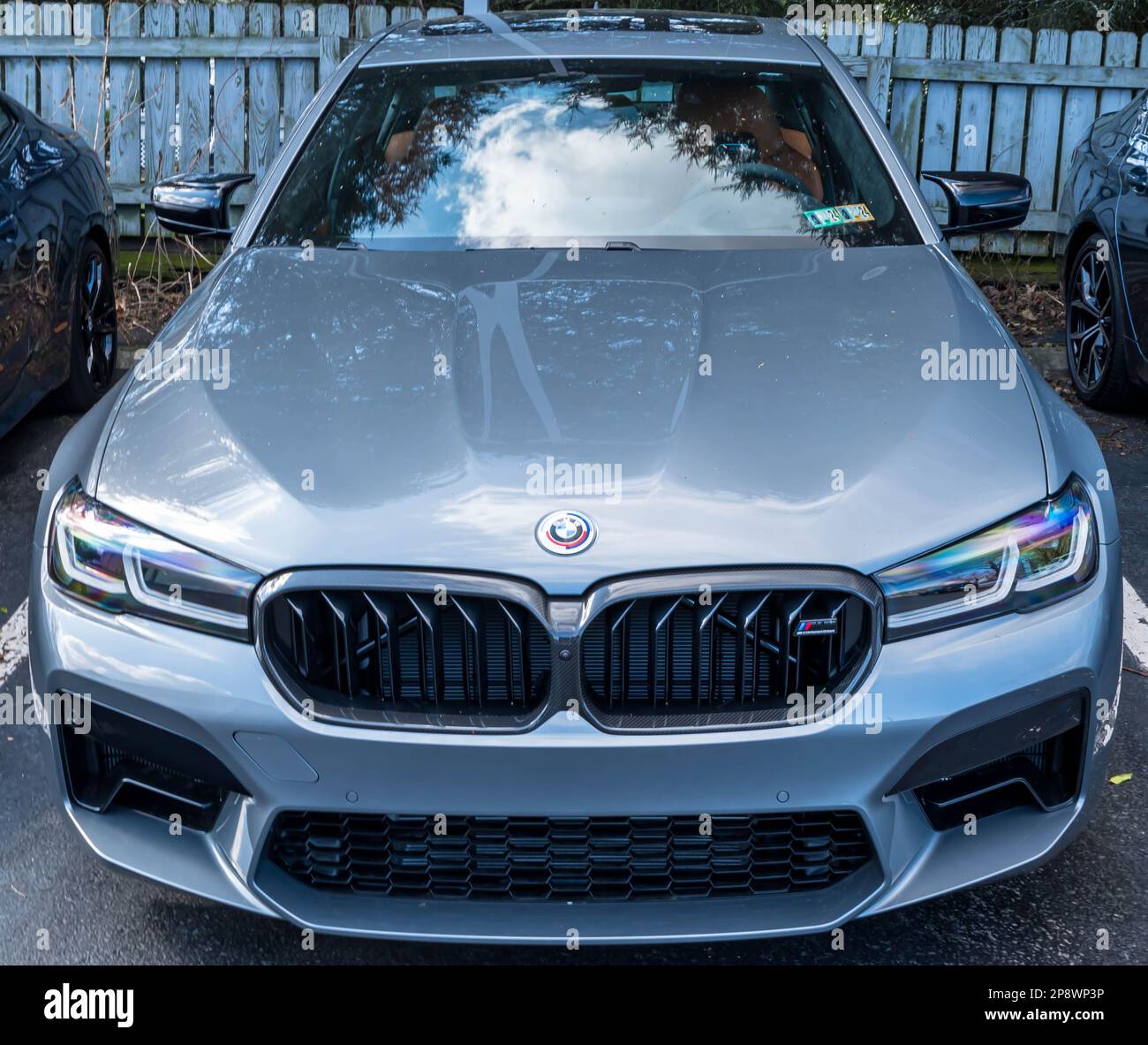 A new, silver BMW sedan for sale at a dealership in Sewickley ...
