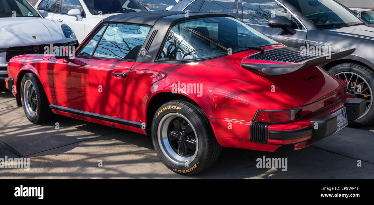 A used, red Porsche coupe for sale at a dealership in Sewickley ...