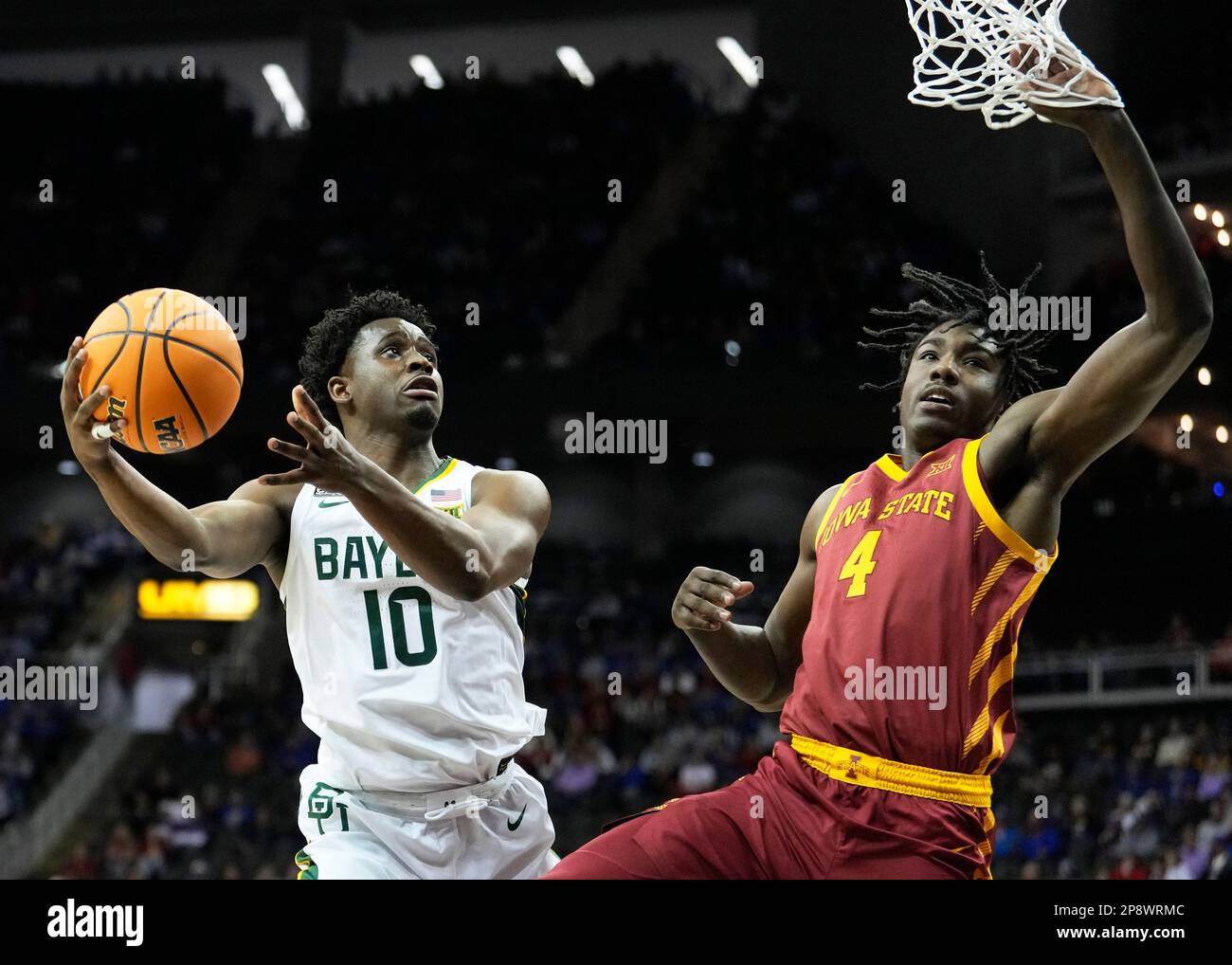 MAR 09 2023: Baylor guard Adam Flagler (10) puts up a shot against Iowa ...