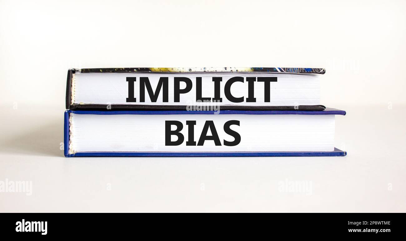 Implicit bias symbol. Concept words Implicit bias on books. Beautiful ...