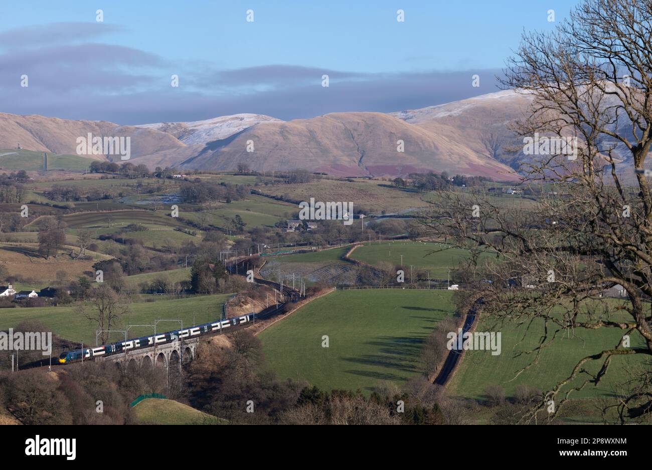With the Howgills behind an Avanti West Coast Alstom Pendolino train ...