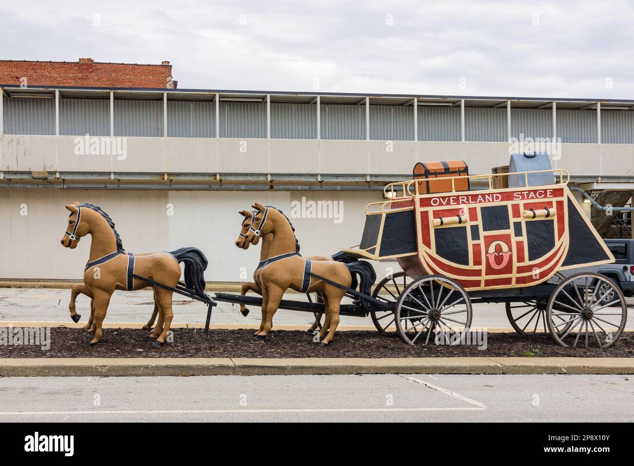 Missouri, FEB 24 2023 - Overland Stage statue and cityscape of Kansas ...