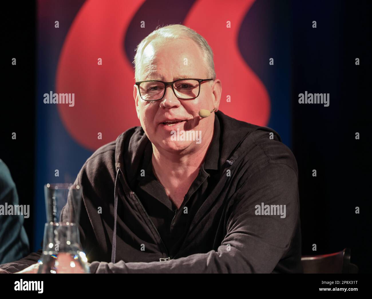 Cologne, Germany. 09th Mar, 2023. Bret Easton Ellis, U.S. author, sits ...