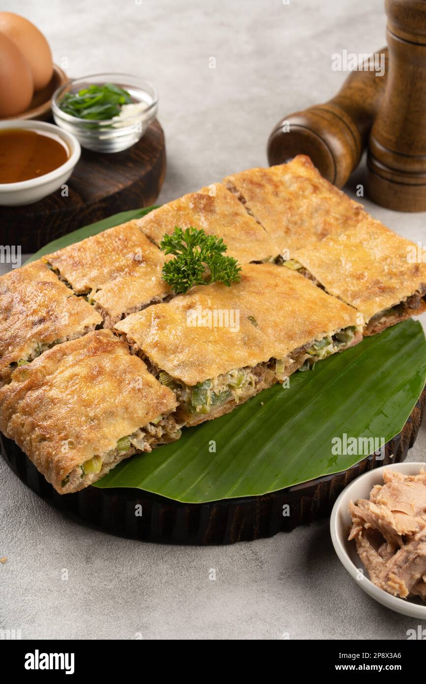 Martabak telur is indonesian street food, made with savory pan fried ...