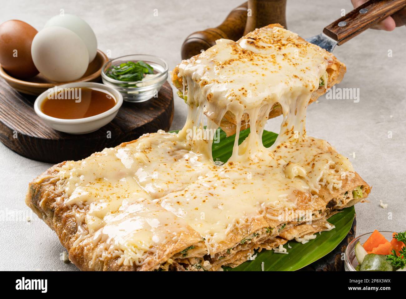 Martabak telur is indonesian street food, made with savory pan fried ...