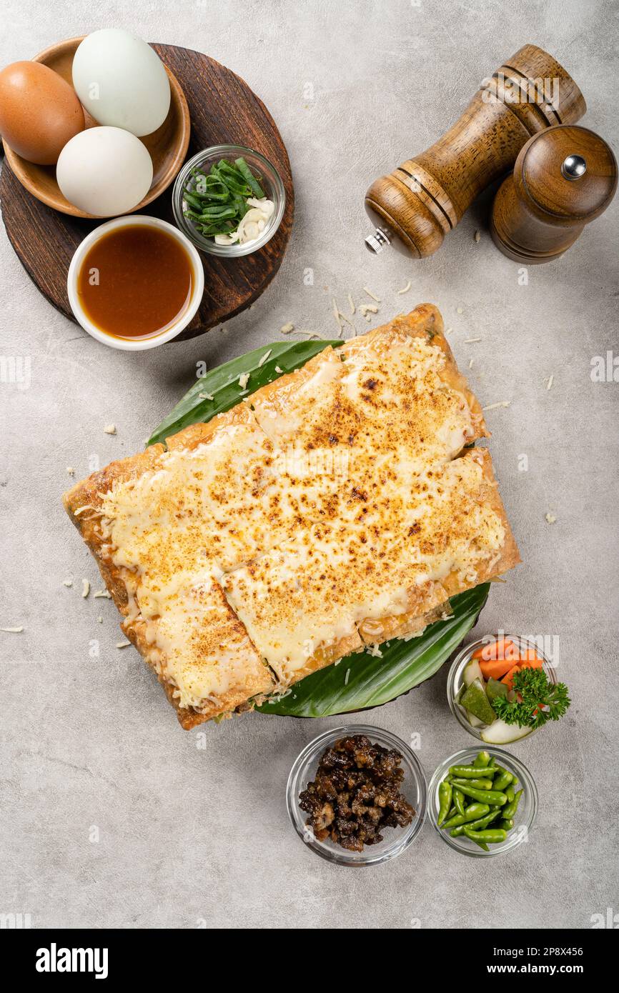 Martabak telur is indonesian street food, made with savory pan fried ...