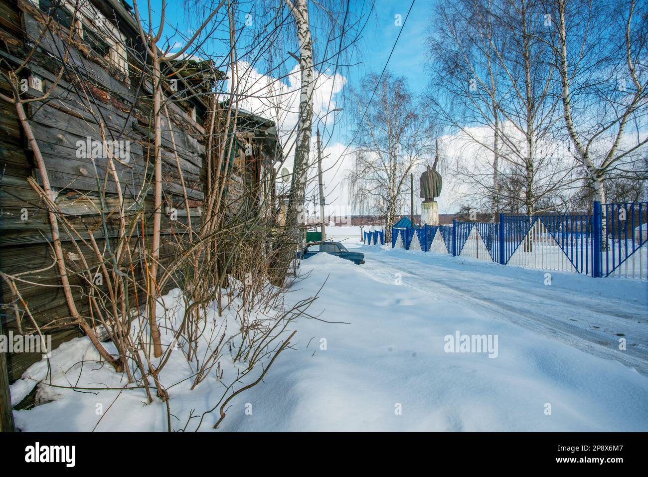 A house with a collapsed roof and walls next to the monument about the ...