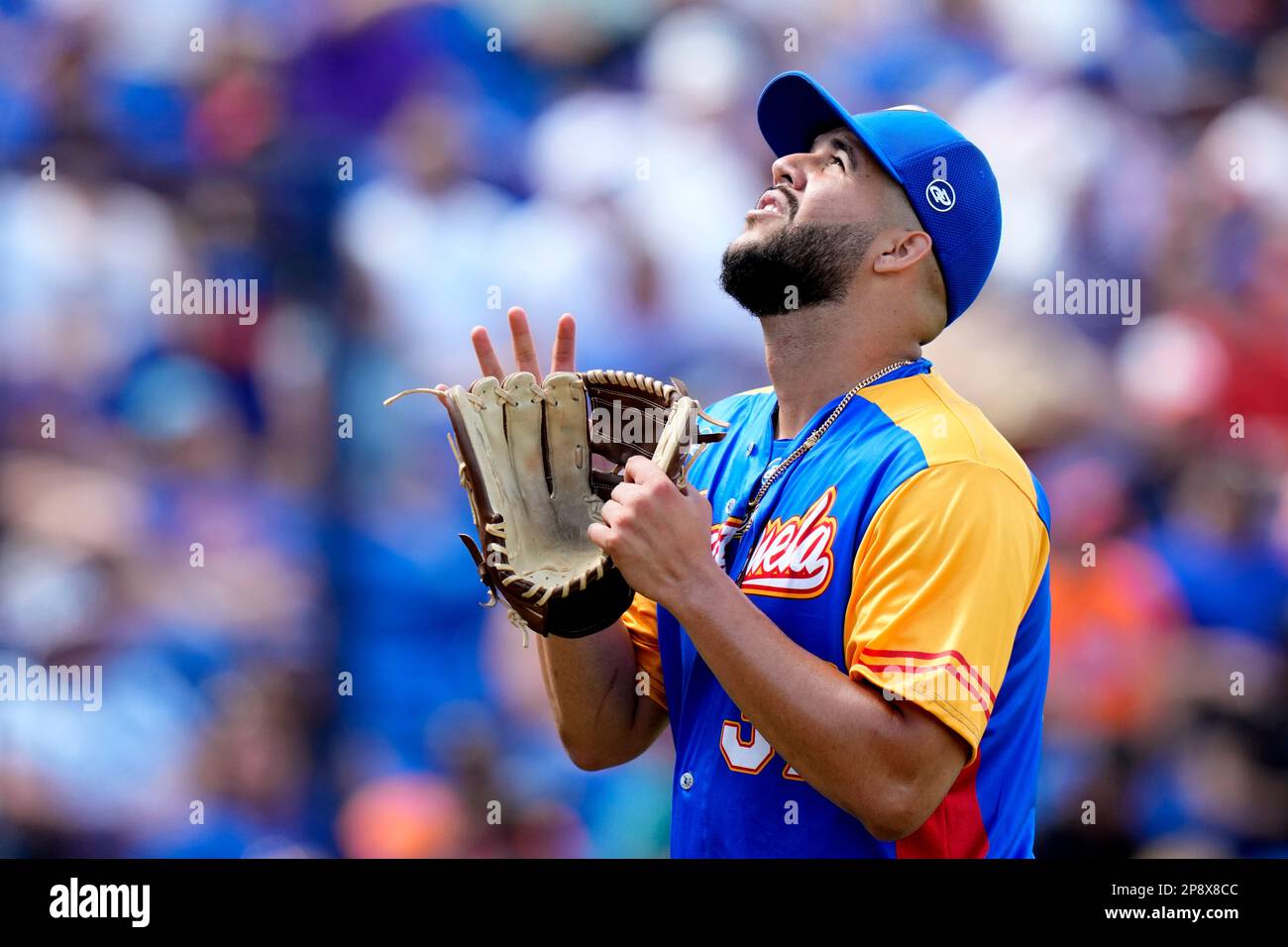Venezuela starting pitcher Enmanuel De Jesus walks off the mound after ...