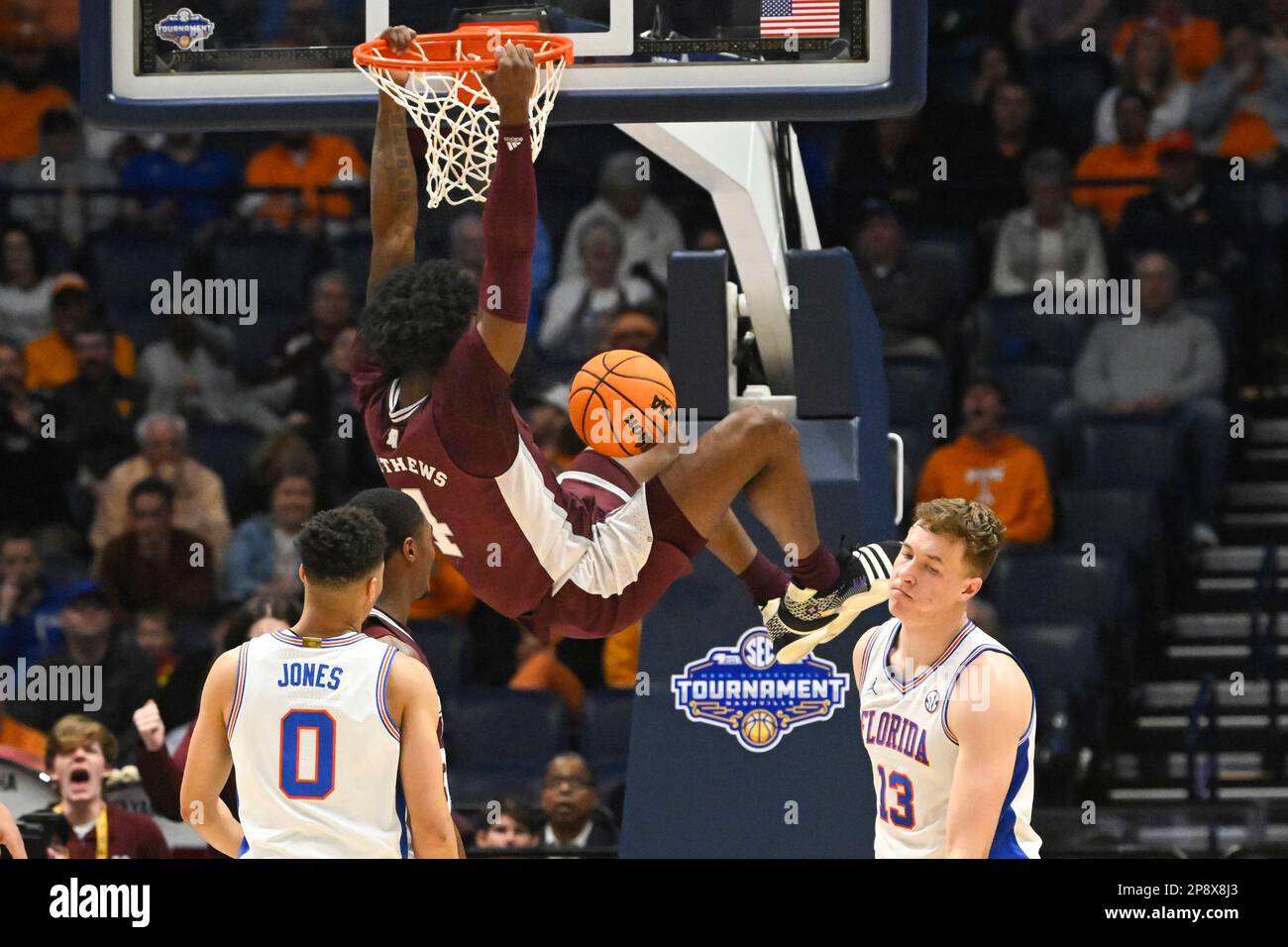 Mississippi State guard Cameron Matthews (4) dunks as Florida forward ...