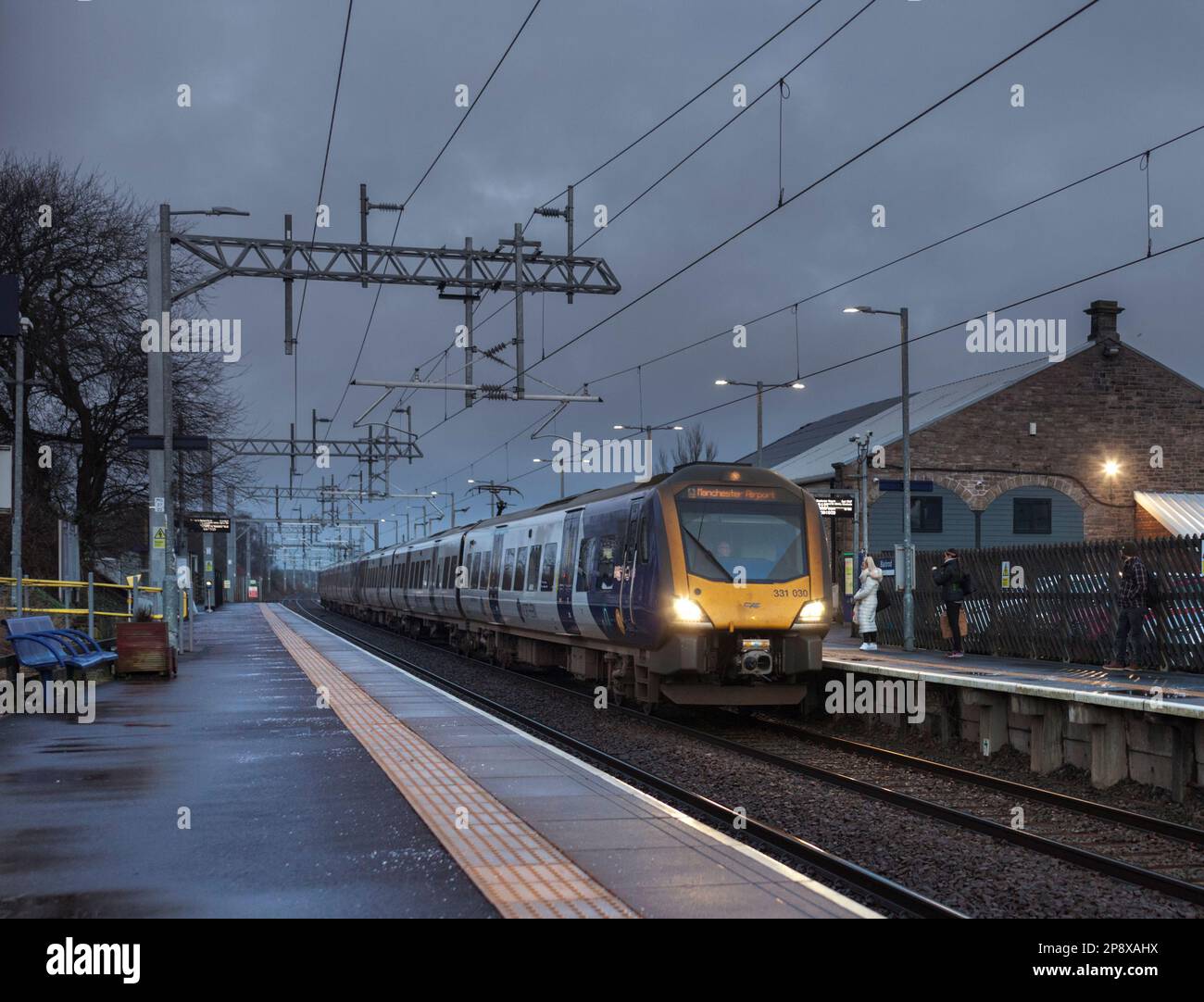 2 Northern Rail CAF built class 331 trains arriving at Blackrod railway ...
