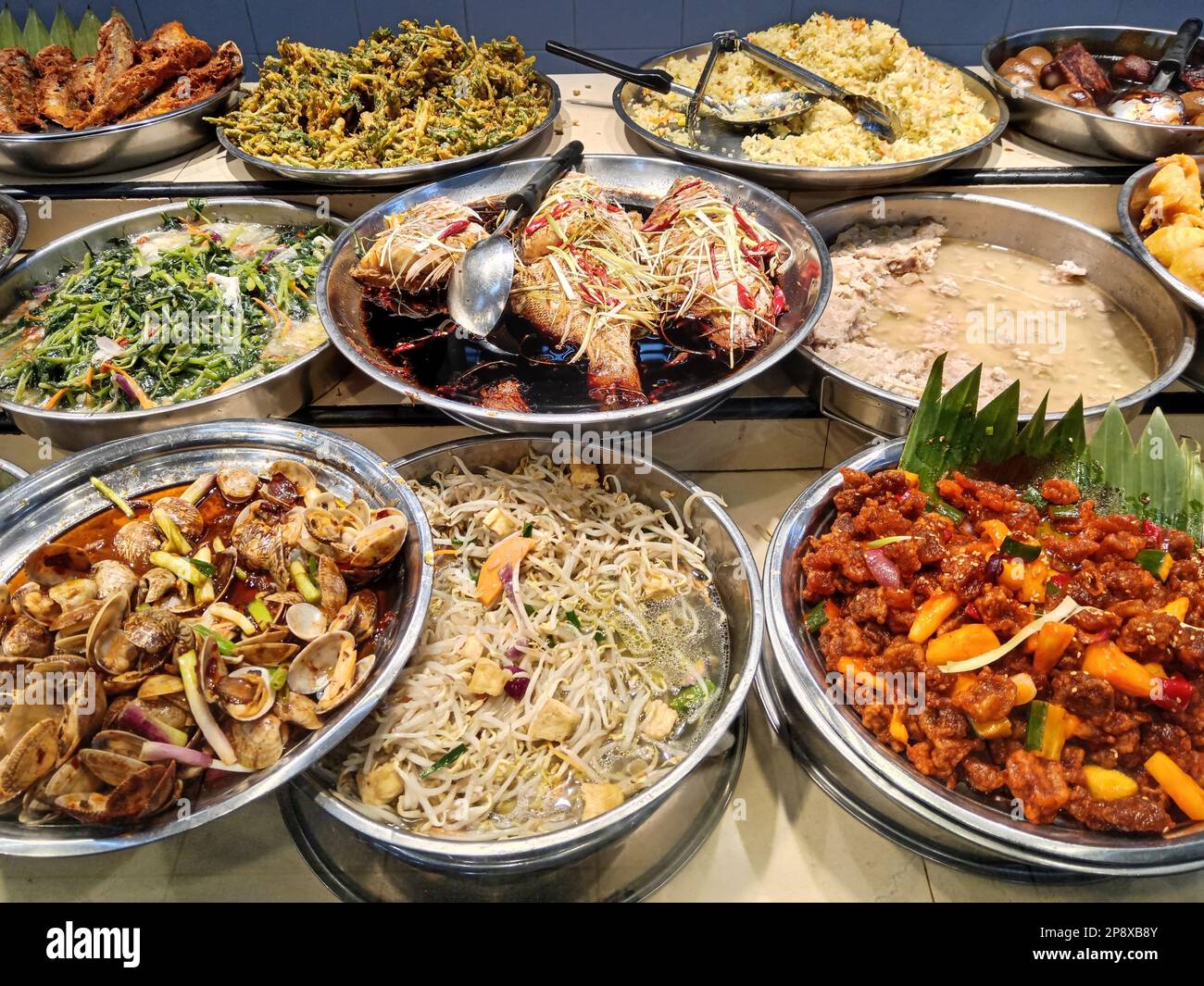 Chinese food at a retaurant buffet in Singapore Stock Photo - Alamy